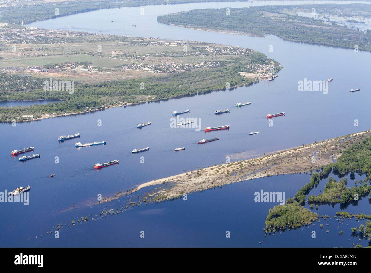 Aerial view of the beautiful Volga River with cargo ships and scenic ...
