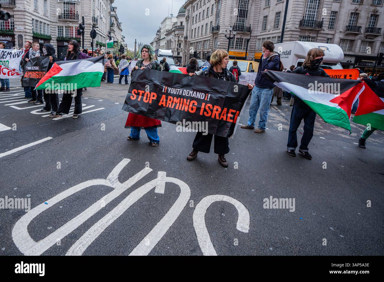 Pro-Palestinian protestors hold banner outside Westminster Abbey during ...