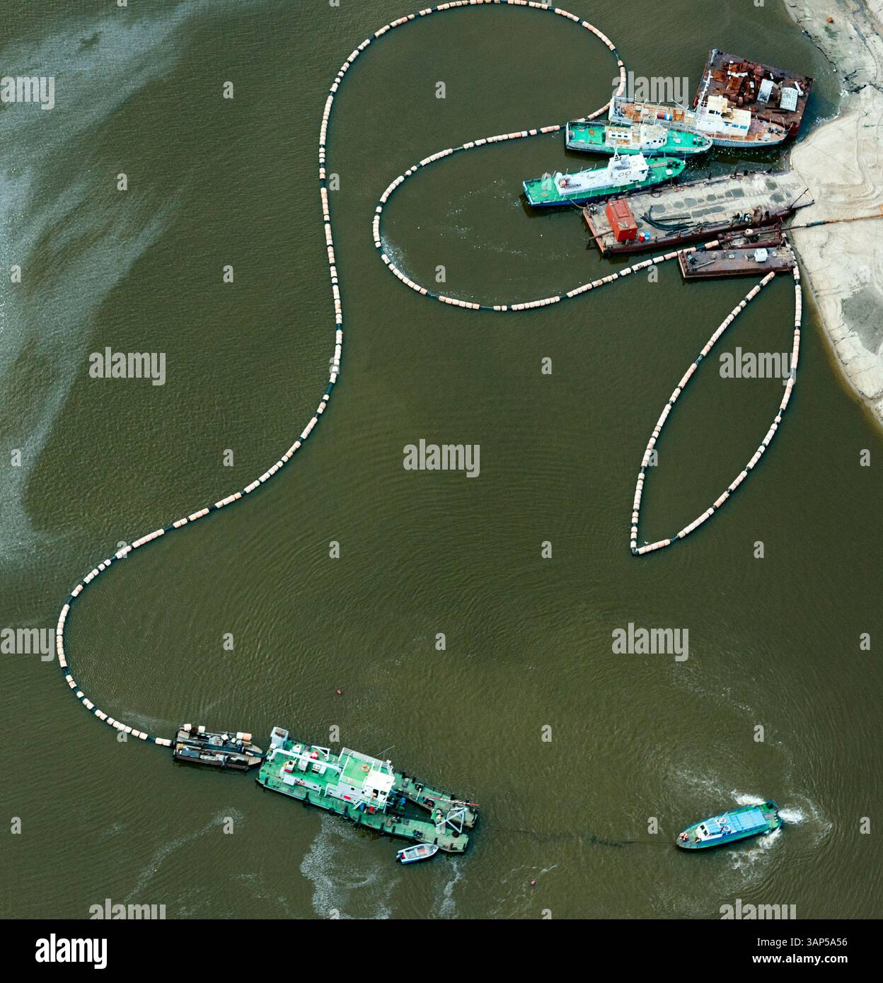 Aerial view of boats and ships navigating the Irtysh River with ...