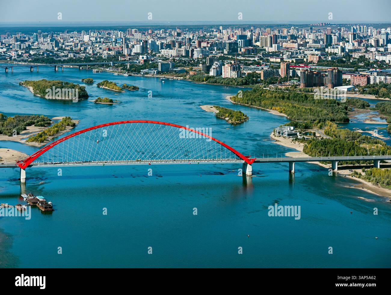 Aerial view of bugrinsky bridge over ob river with beautiful cityscape, Novosibirsk, Russia ...