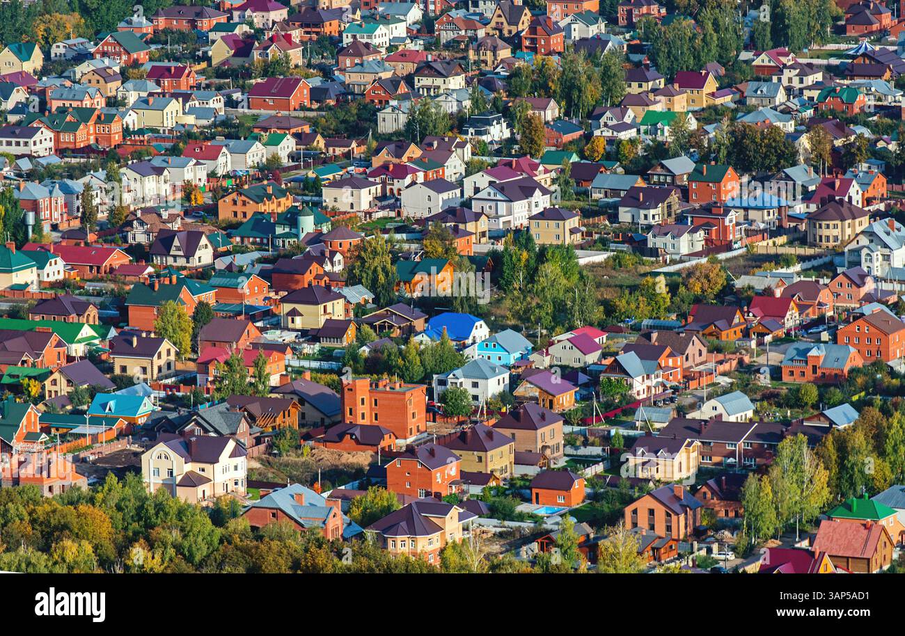 Aerial view of colorful rooftops and residential houses in a vibrant ...