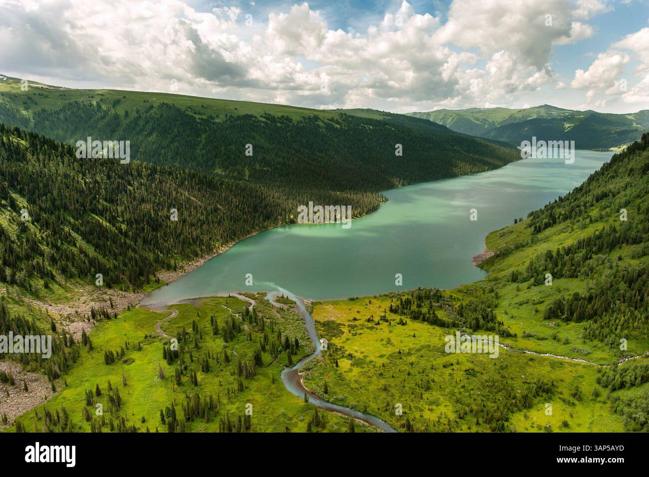 Aerial view of kucherlinskoe lake surrounded by majestic mountains and ...