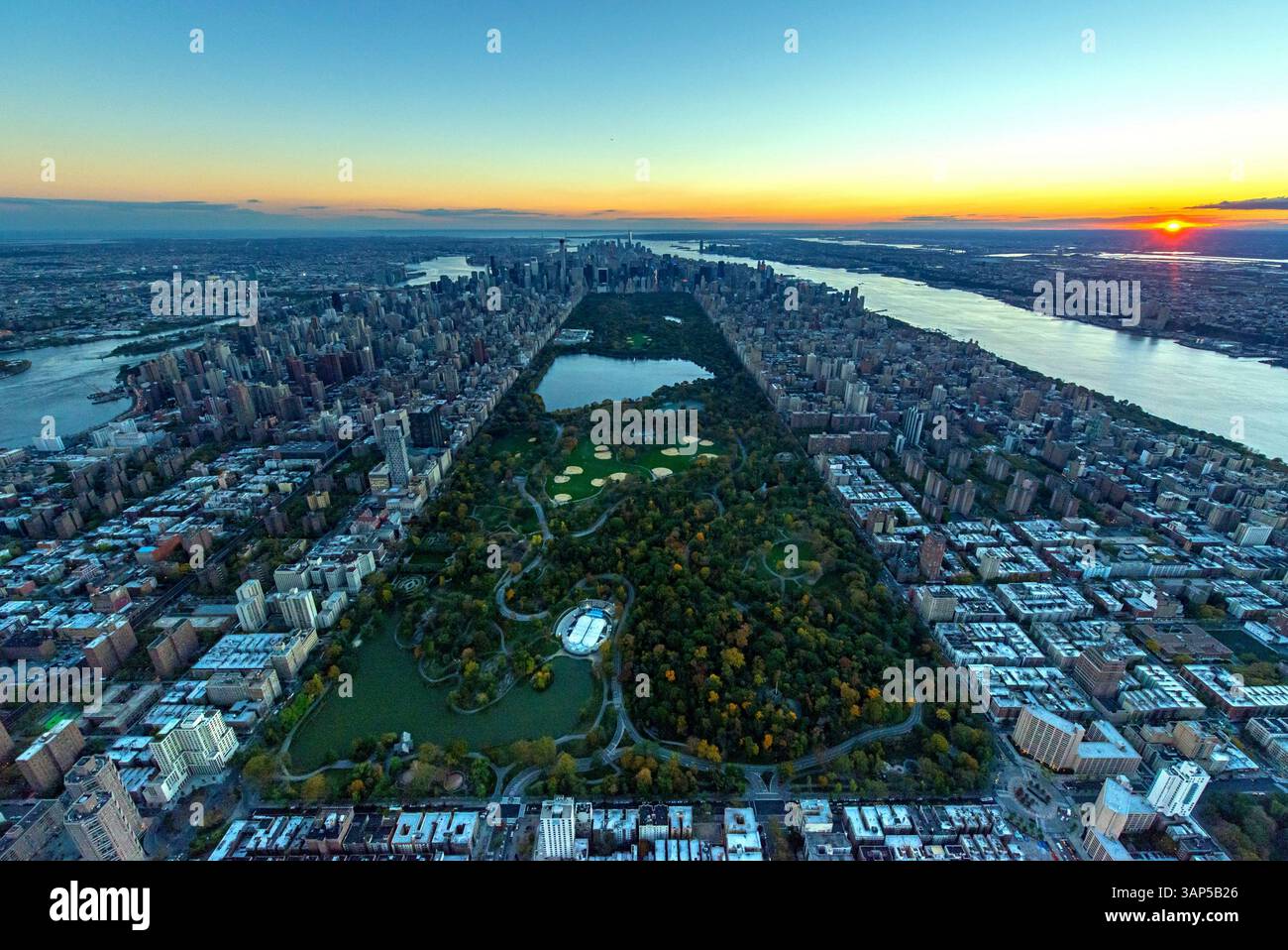 Aerial view of central park surrounded by vibrant cityscape and iconic ...