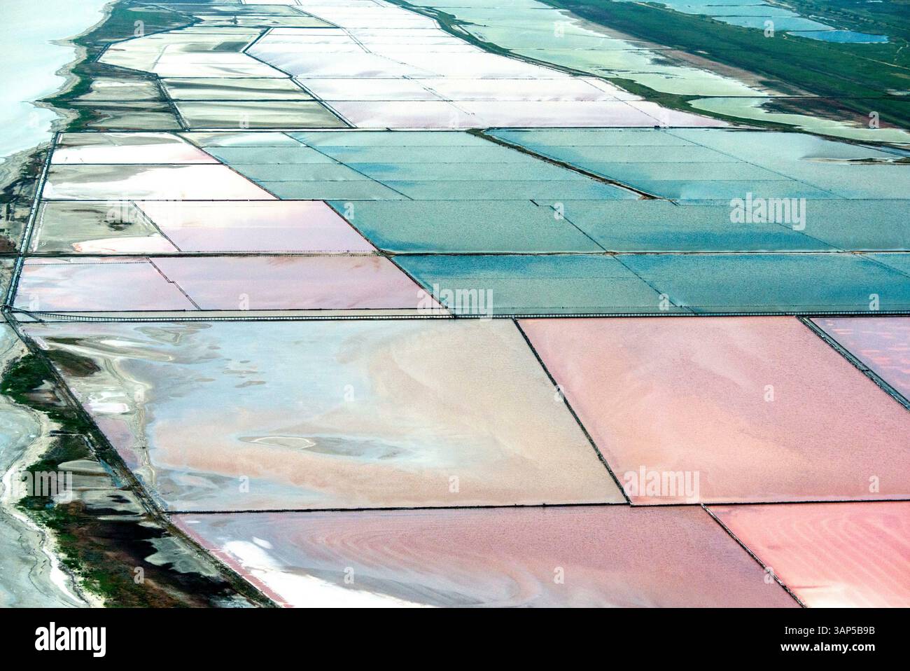 Aerial view of Sasyk Sivash Lake showcasing beautiful pink saline pools ...