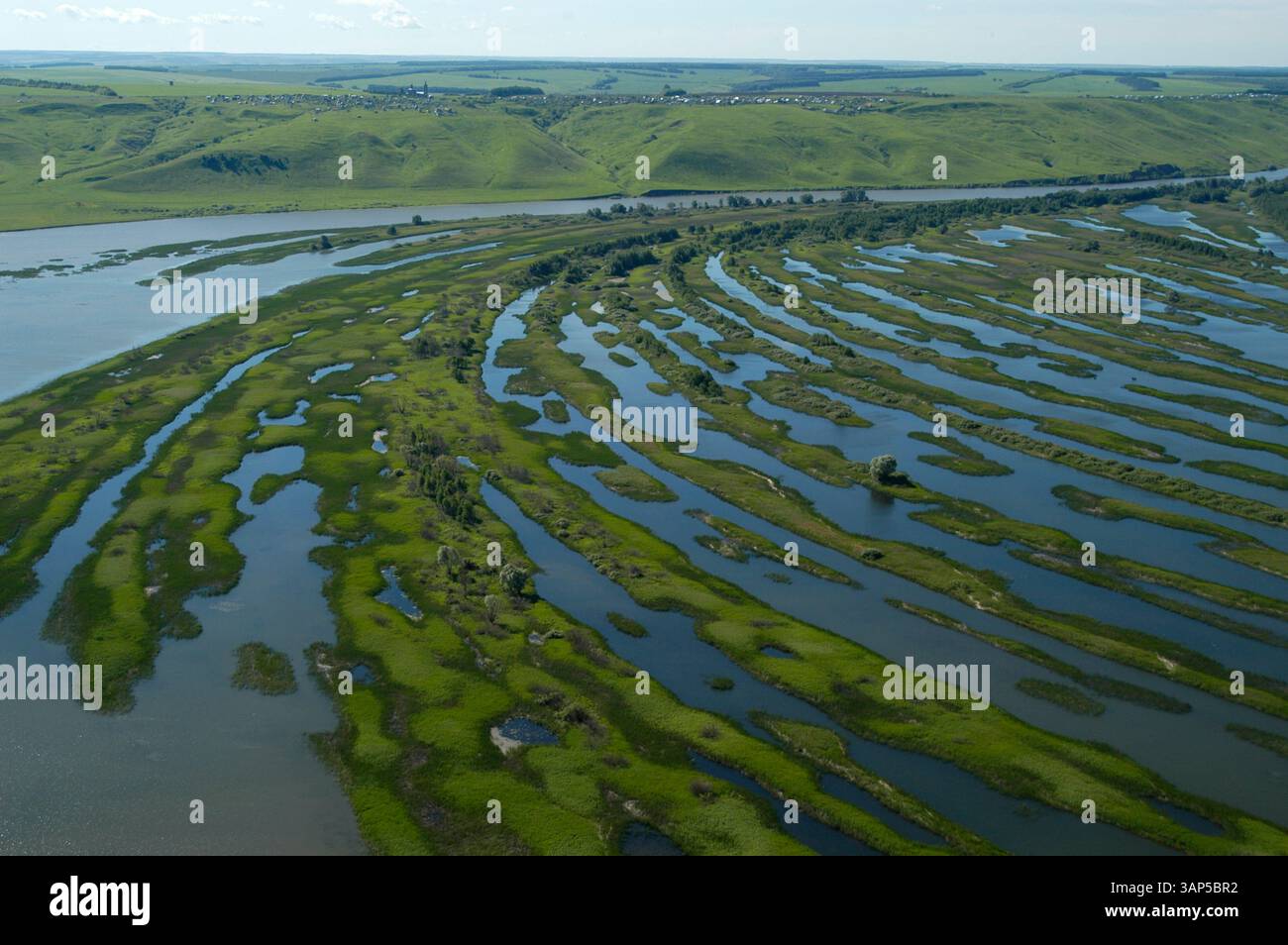 Aerial view of tranquil wetland and meandering river in a picturesque ...