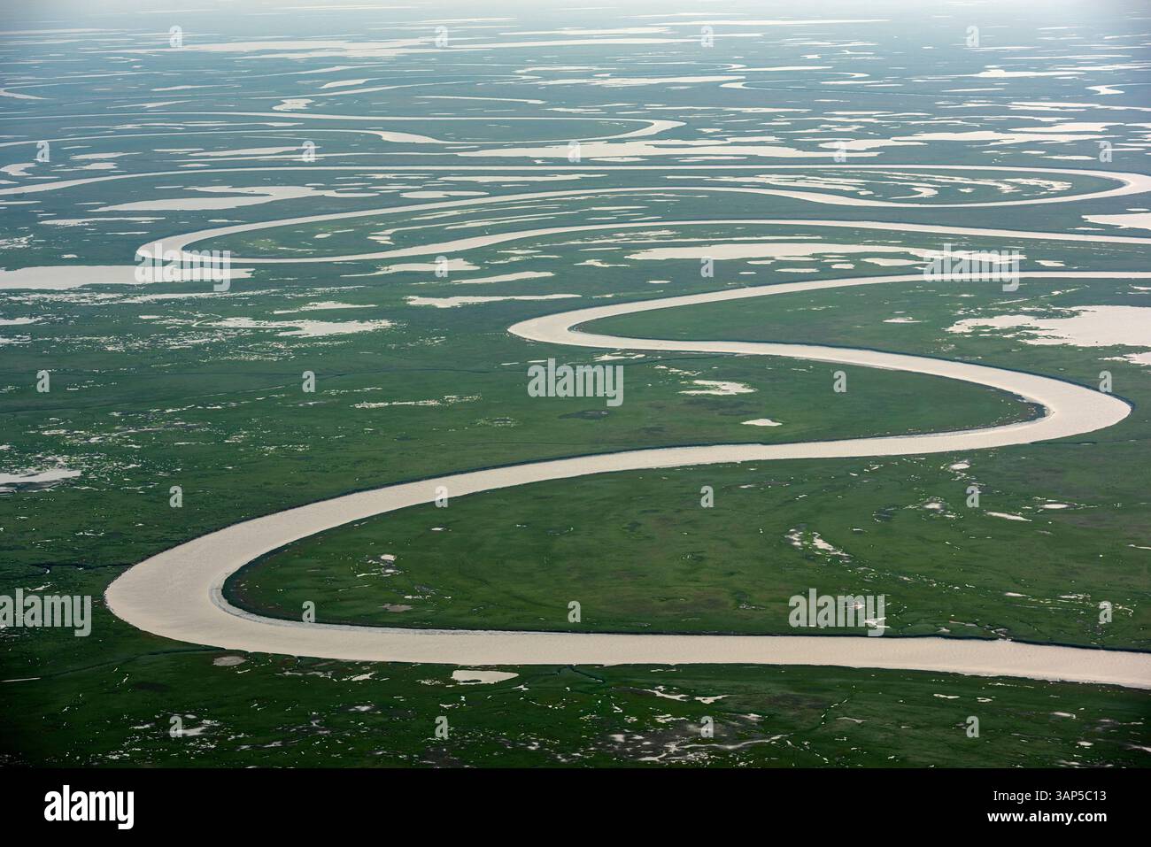 Aerial view meandering river flowing hi-res stock photography and ...