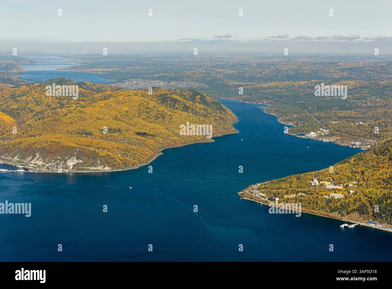Aerial view of baikal lake and angara river surrounded by mountains and ...