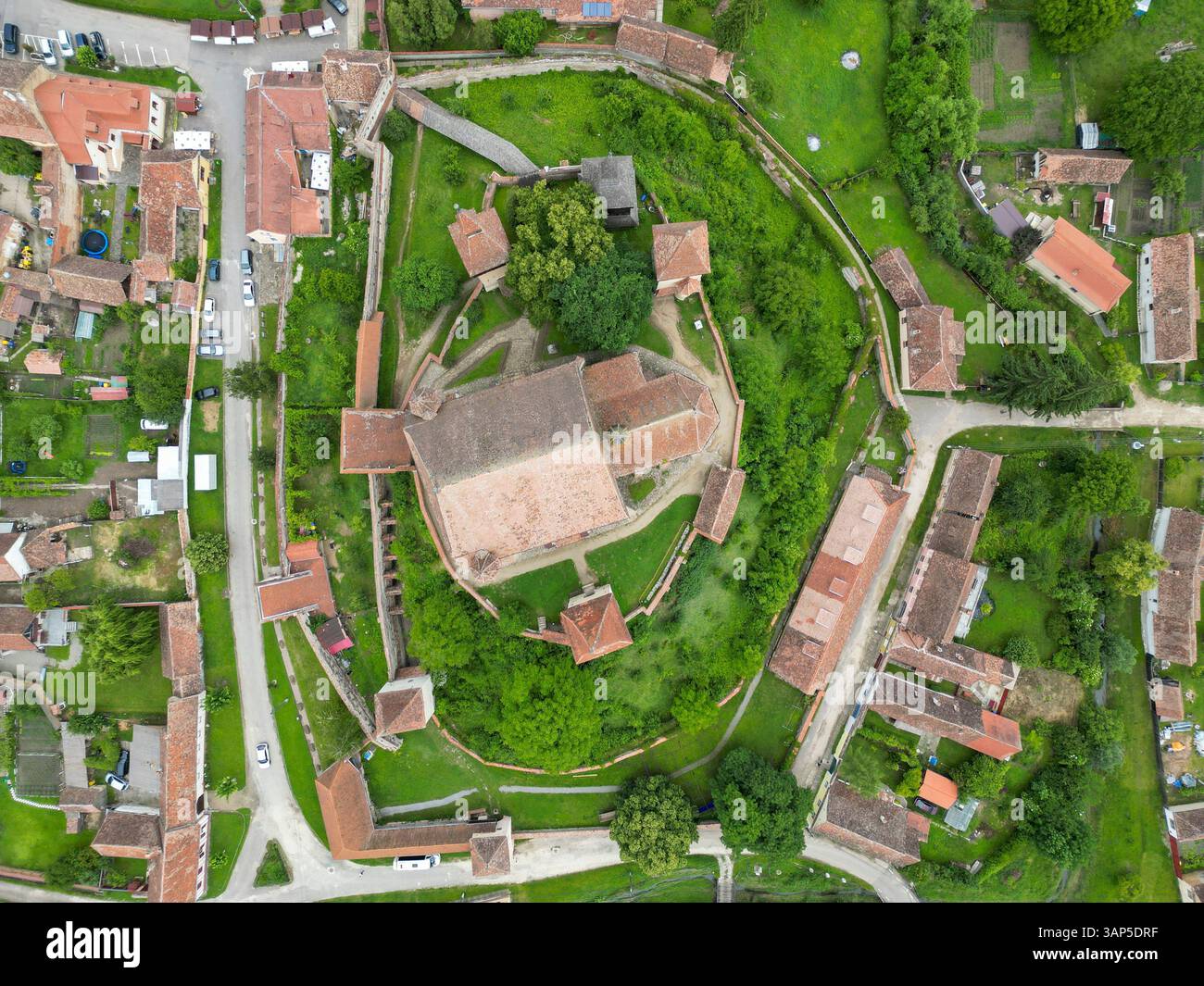 Aerial view of the beautiful Biertan castle surrounded by historic ...
