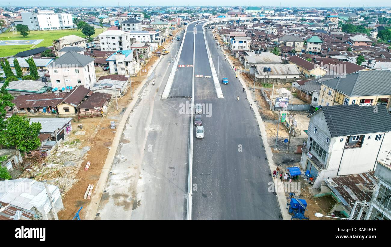 Aerial view of overpass construction and urban development with ...