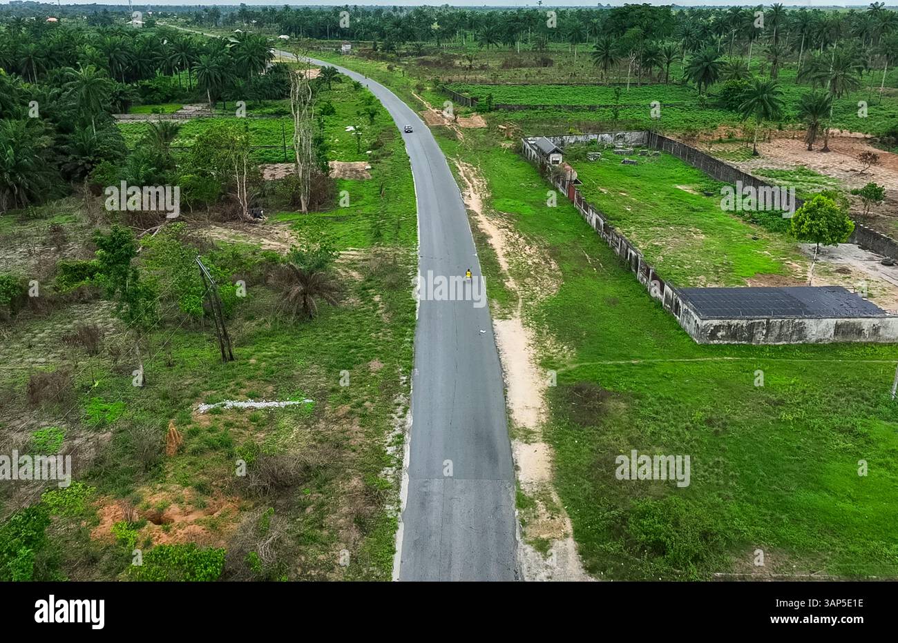Aerial view of Ahoada Main Road surrounded by serene greenery and ...