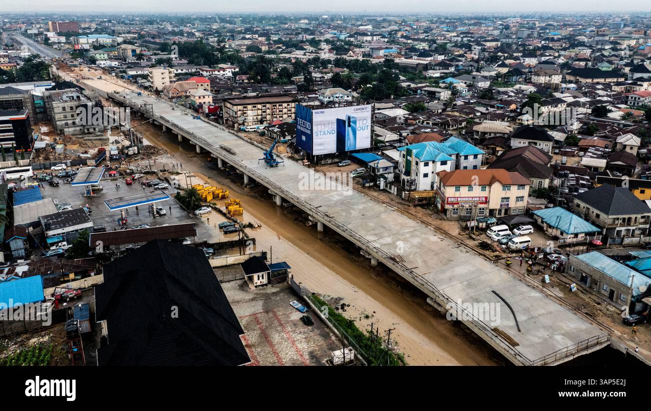 Port Harcourt, Nigeira - 30 August 2021: Aerial view of overpass construction and urban ...