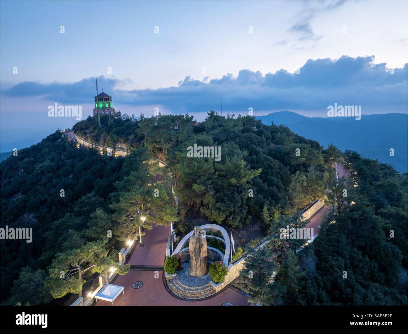 Aerial view of throni church surrounded by serene mountains and lush ...