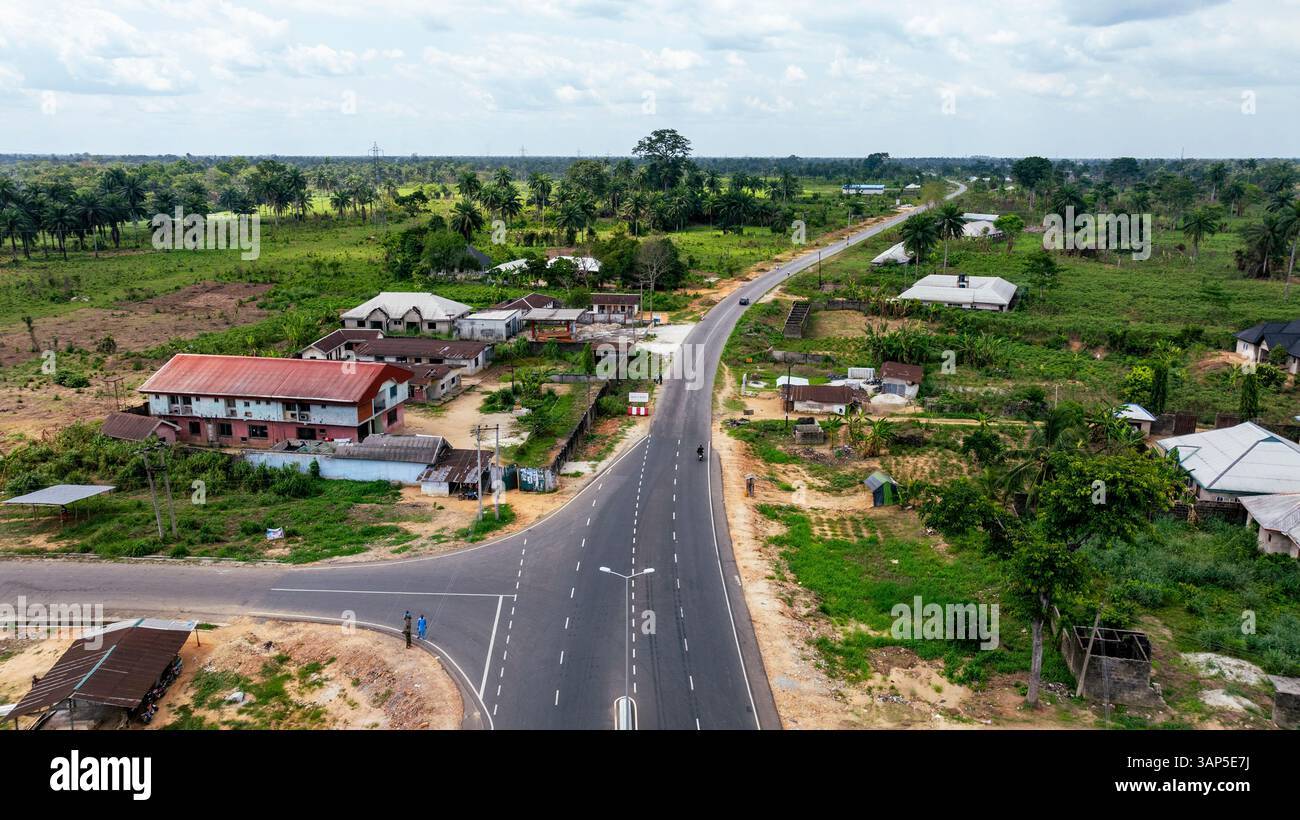 Aerial view of Ahoada Main Road surrounded by beautiful homes and lush ...