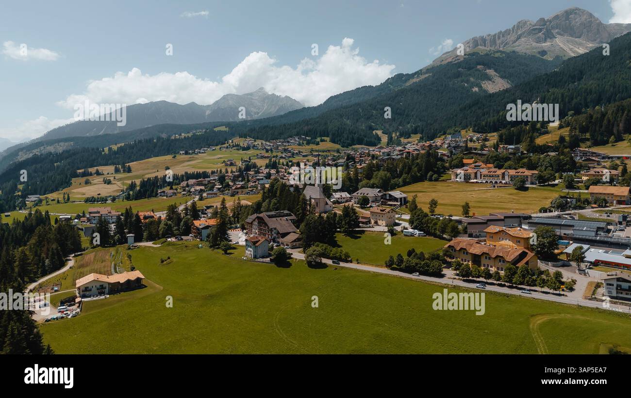 Aerial view of Italian Alps with Dolomites forms and Church Dolomiti ...