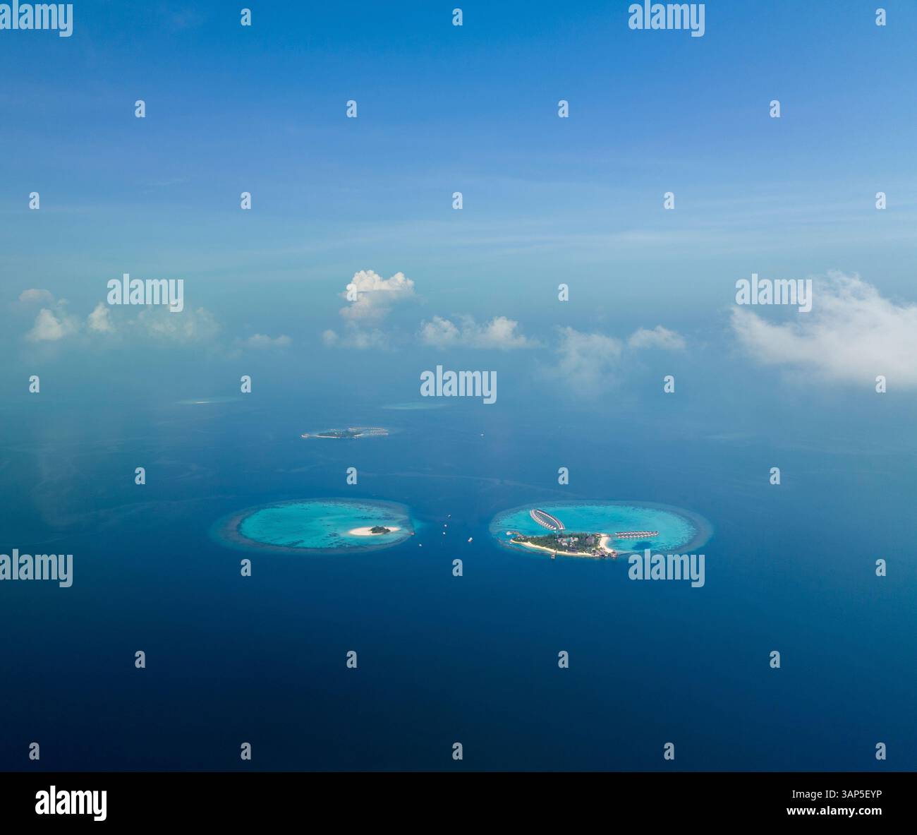 Aerial view of scattered islands on the Indian Ocean at Maldives ...