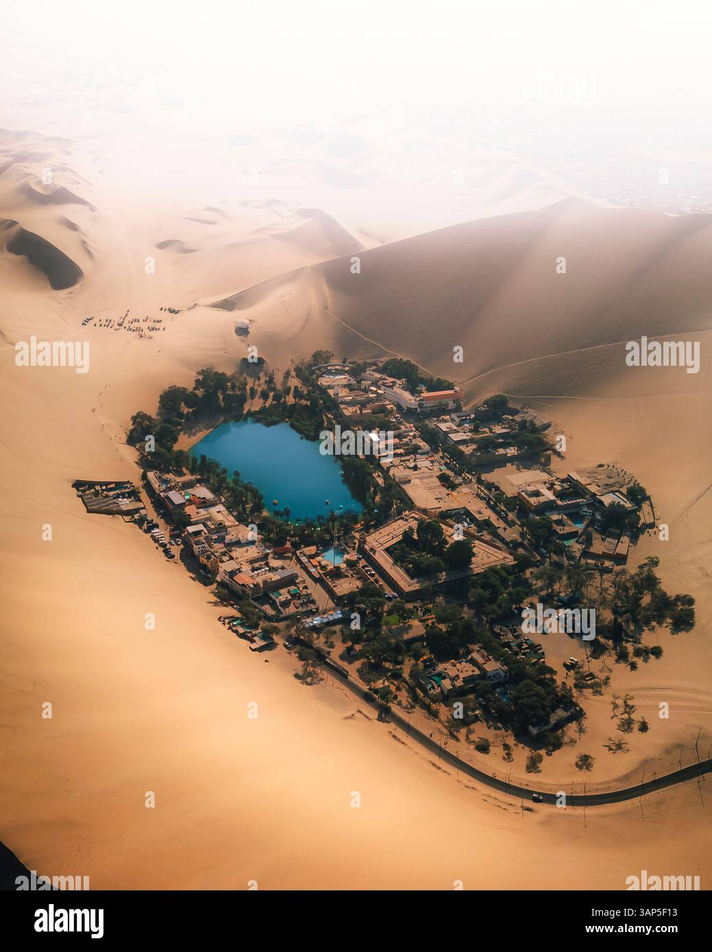 Aerial drone view of the of the oasis of Huacachina in De Ica desert ...