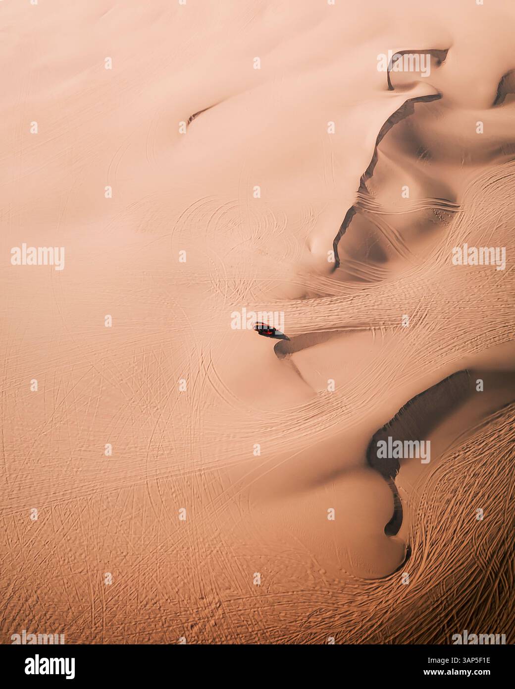 Aerial drone view of a car on De Ica desert sand dunes, Huacachina, Ica ...