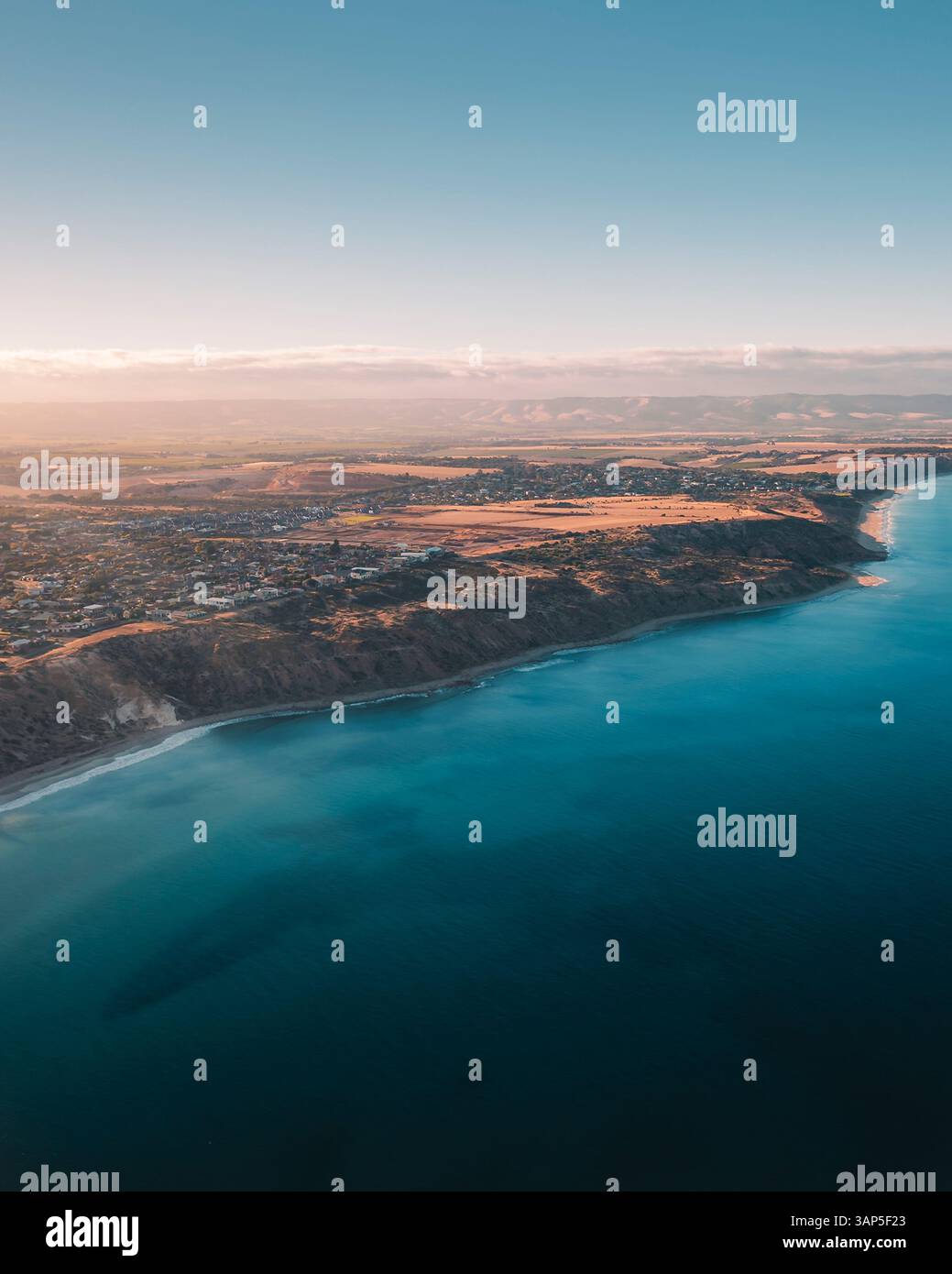 Aerial drone view at sunset of Moana Beach in Fleurieu Peninsula, South ...
