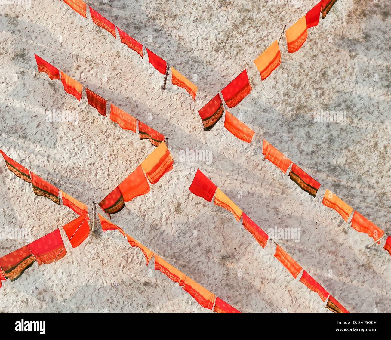 Aerial view of vibrant batik fabrics with colorful patterns and ...