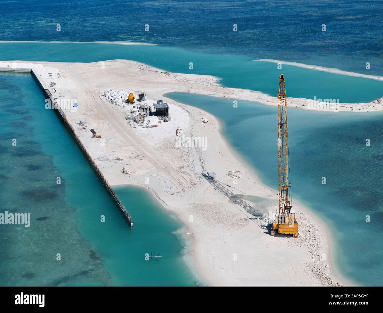 Aerial view of the construction of an artificial island with an ...