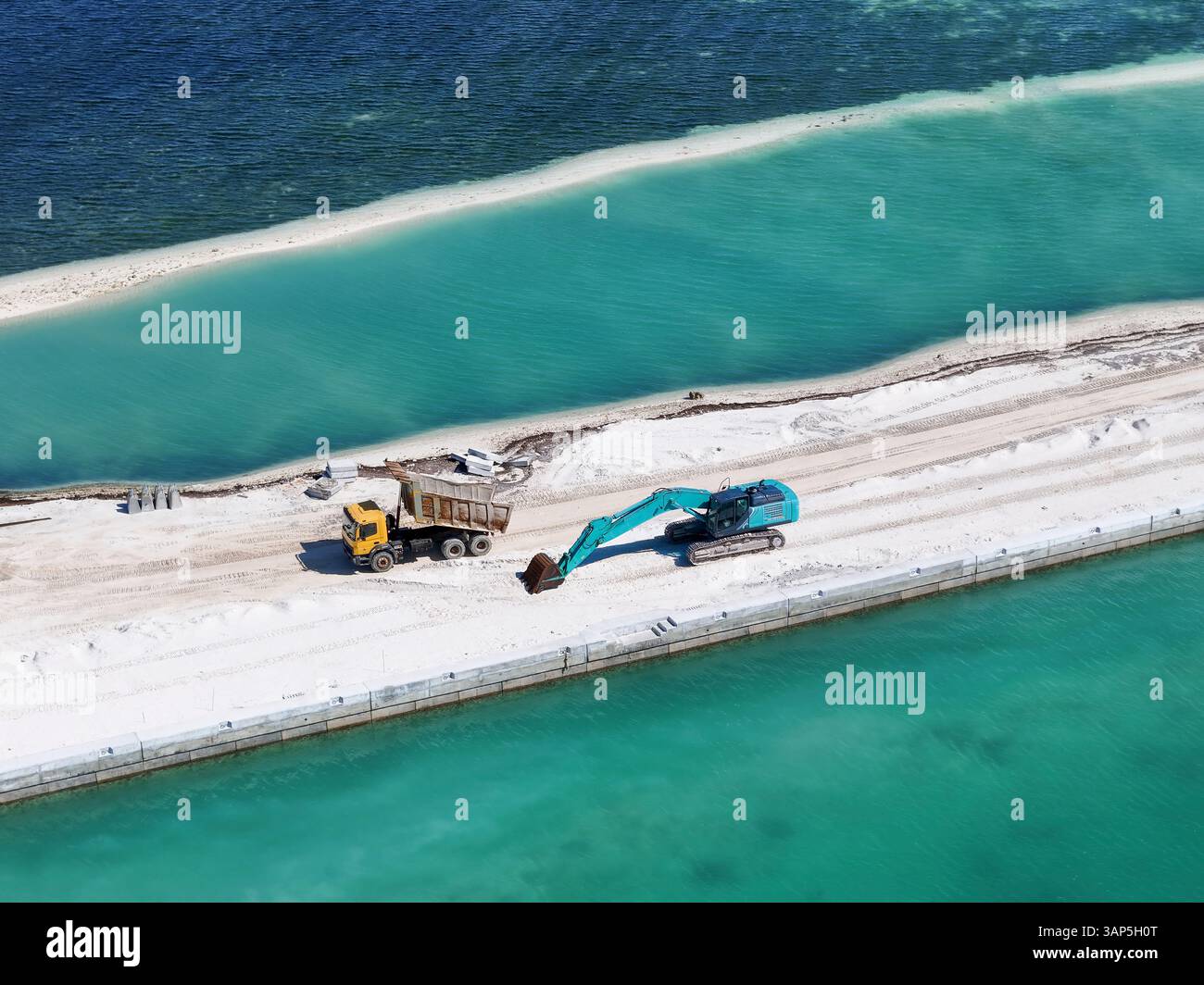 Aerial view of the construction site with excavator and truck on an ...