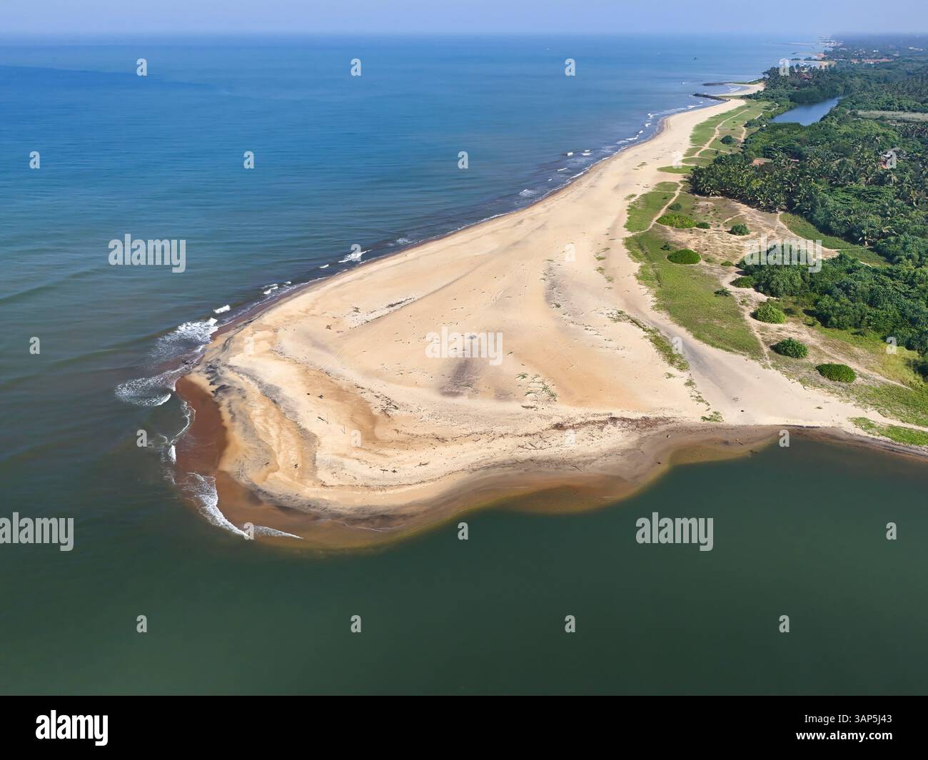 Aerial view of river Maha Oya estuary meeting the Indian Ocean, Negombo ...