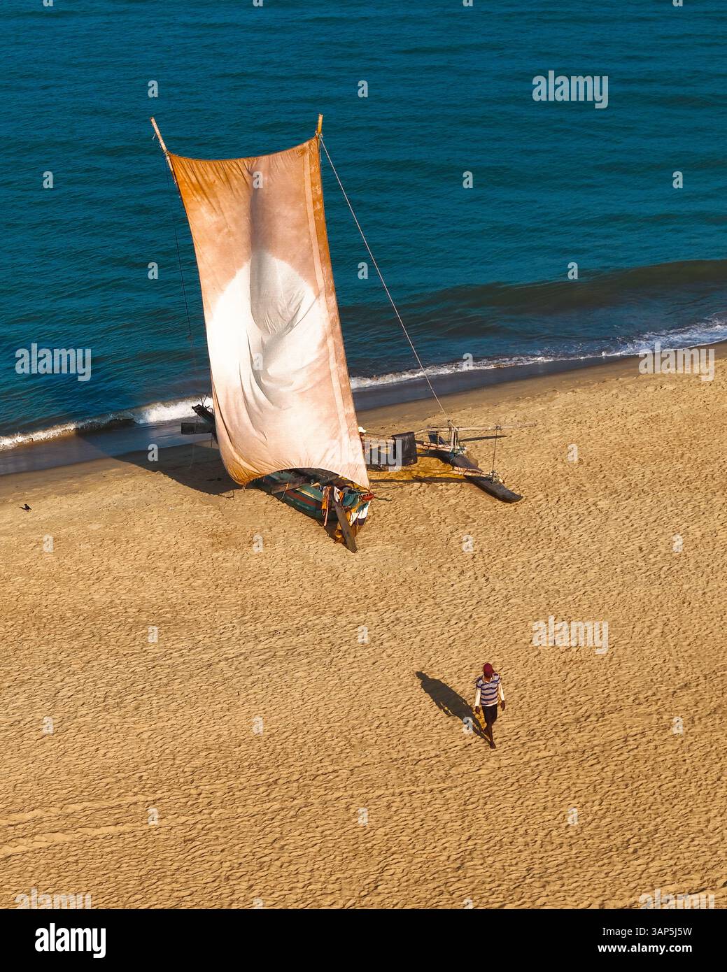 Aerial view of beautiful sandy beach with people, Negombo, Sri Lanka ...
