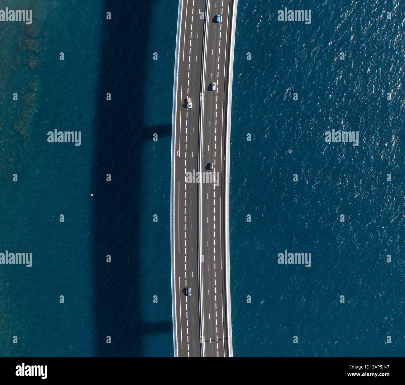 Aerial view of the new and old coastal road Route du Littoral ...