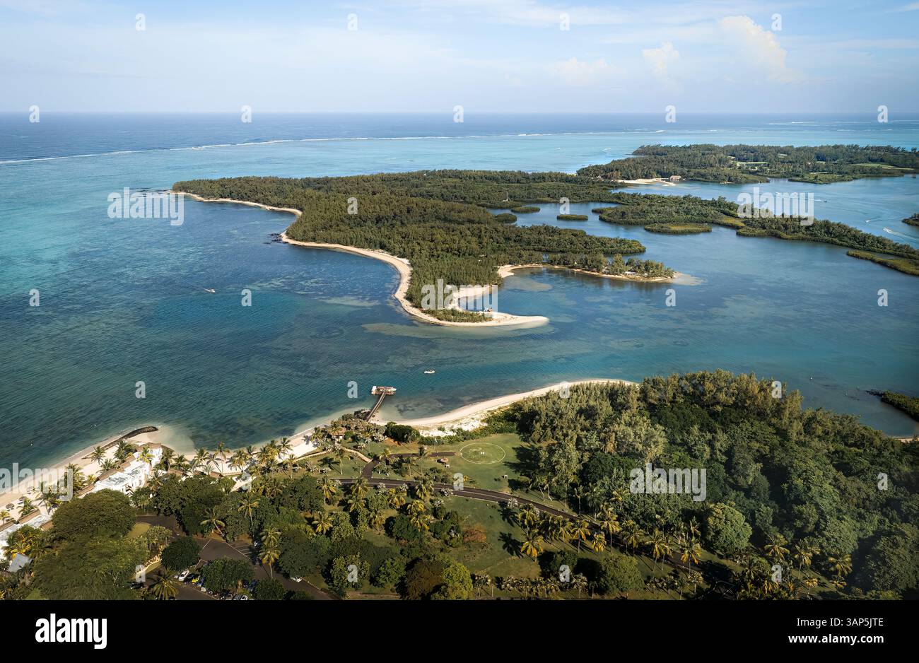 Panoramic aerial drone view of Shangri La Le Touessrok with helicopter ...