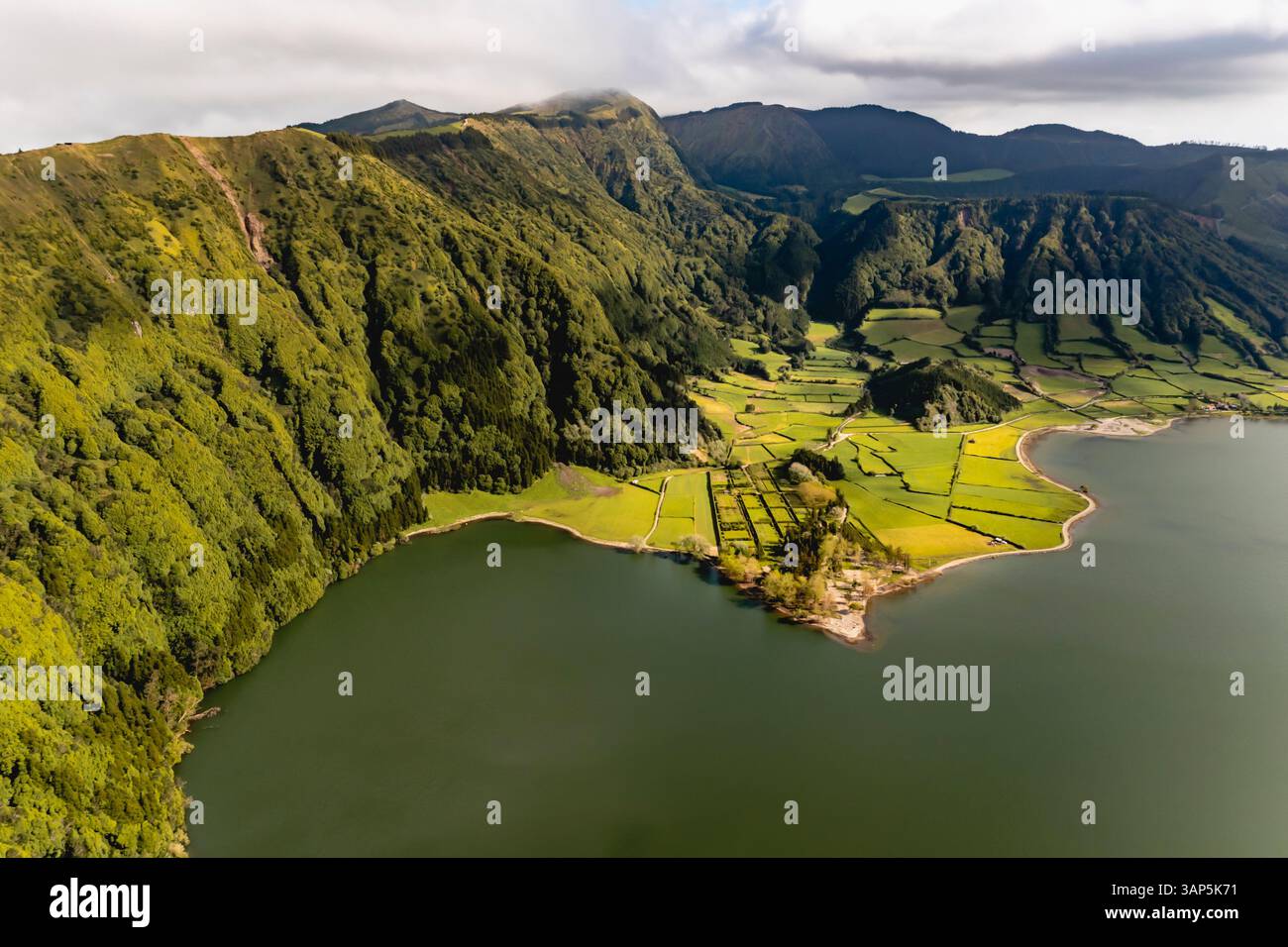 Aerial View of fields grown along the coast of the lake Lagoa Verde ...