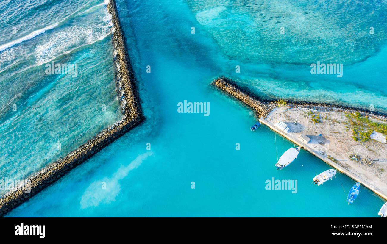 Aerial view of the harbour entry of local / inhabited island Vashafaru ...