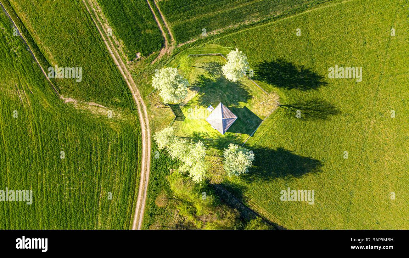 Aerial view of a spring landscape with trees and a hut, Germany ...