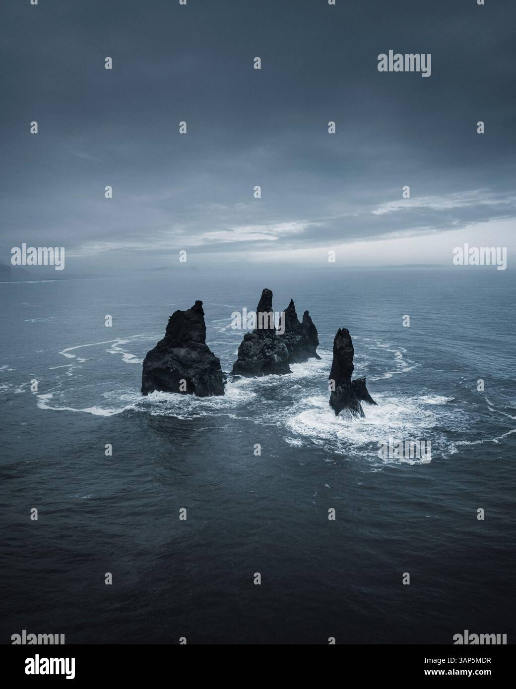 Aerial view of Reynisdrangar sea stacks near Vik, Iceland Stock Photo ...