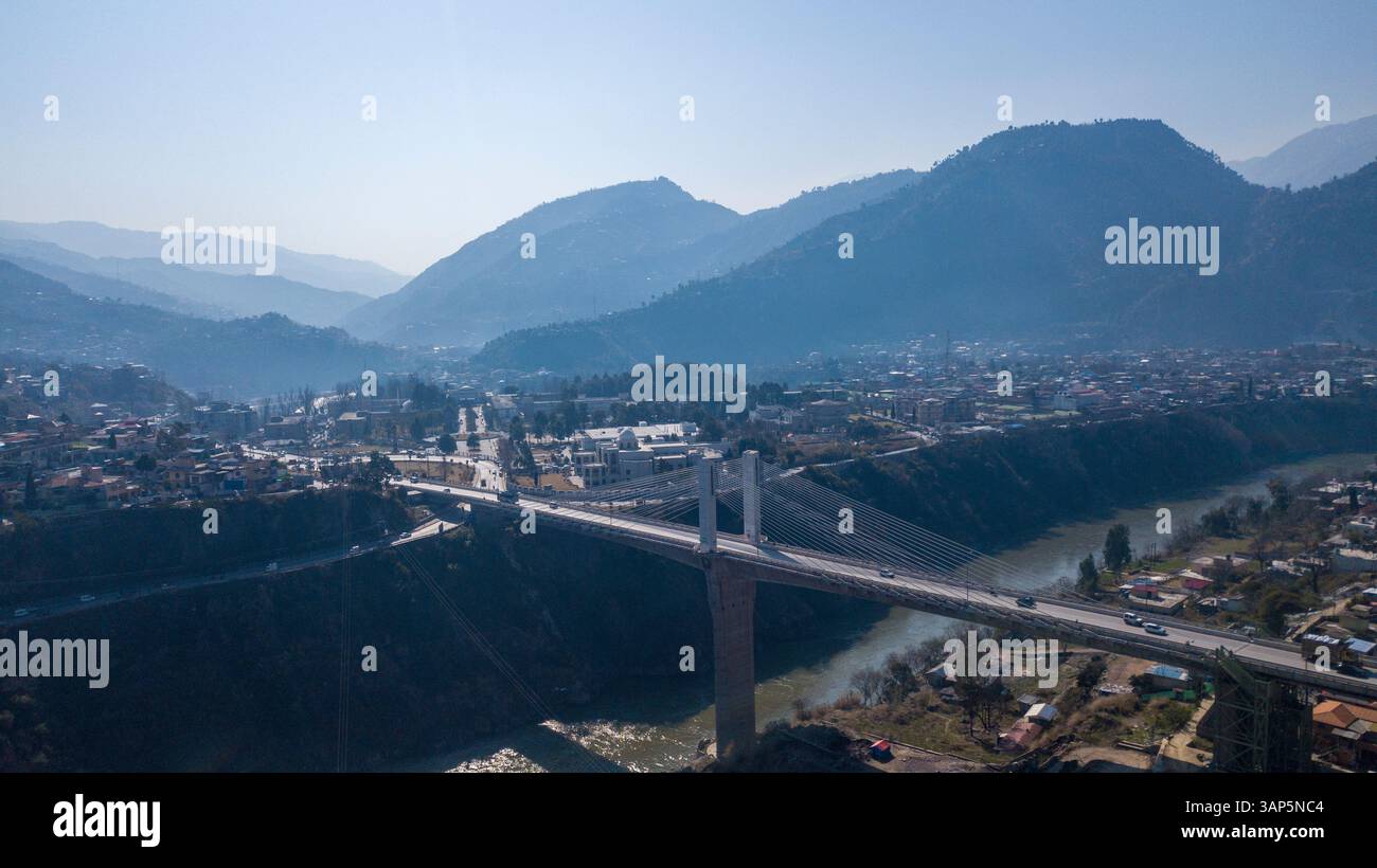 Aerial view of the earth quake memorial bridge spanning a river amidst ...