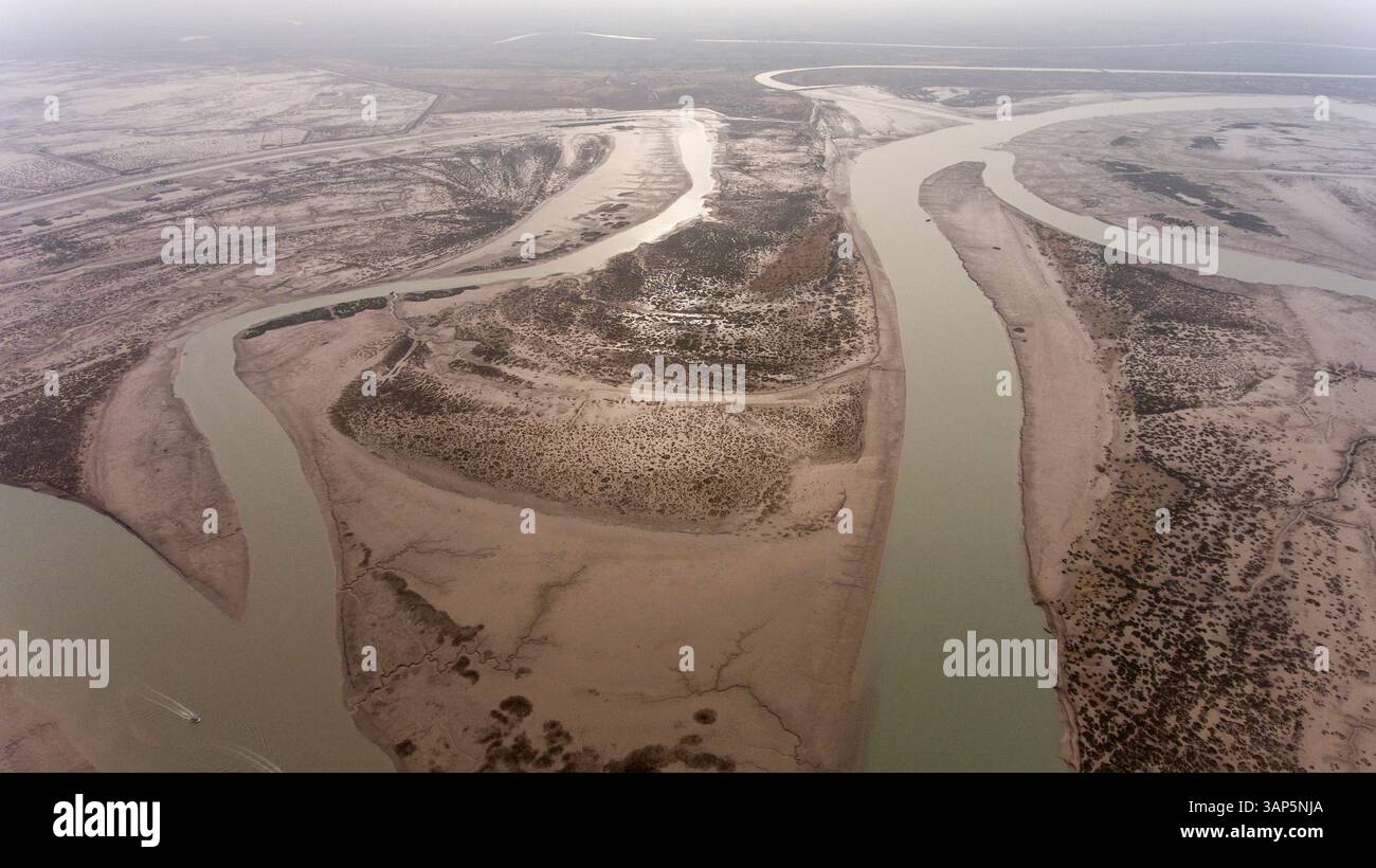 Aerial view of tranquil mangroves and winding river in a pristine ...