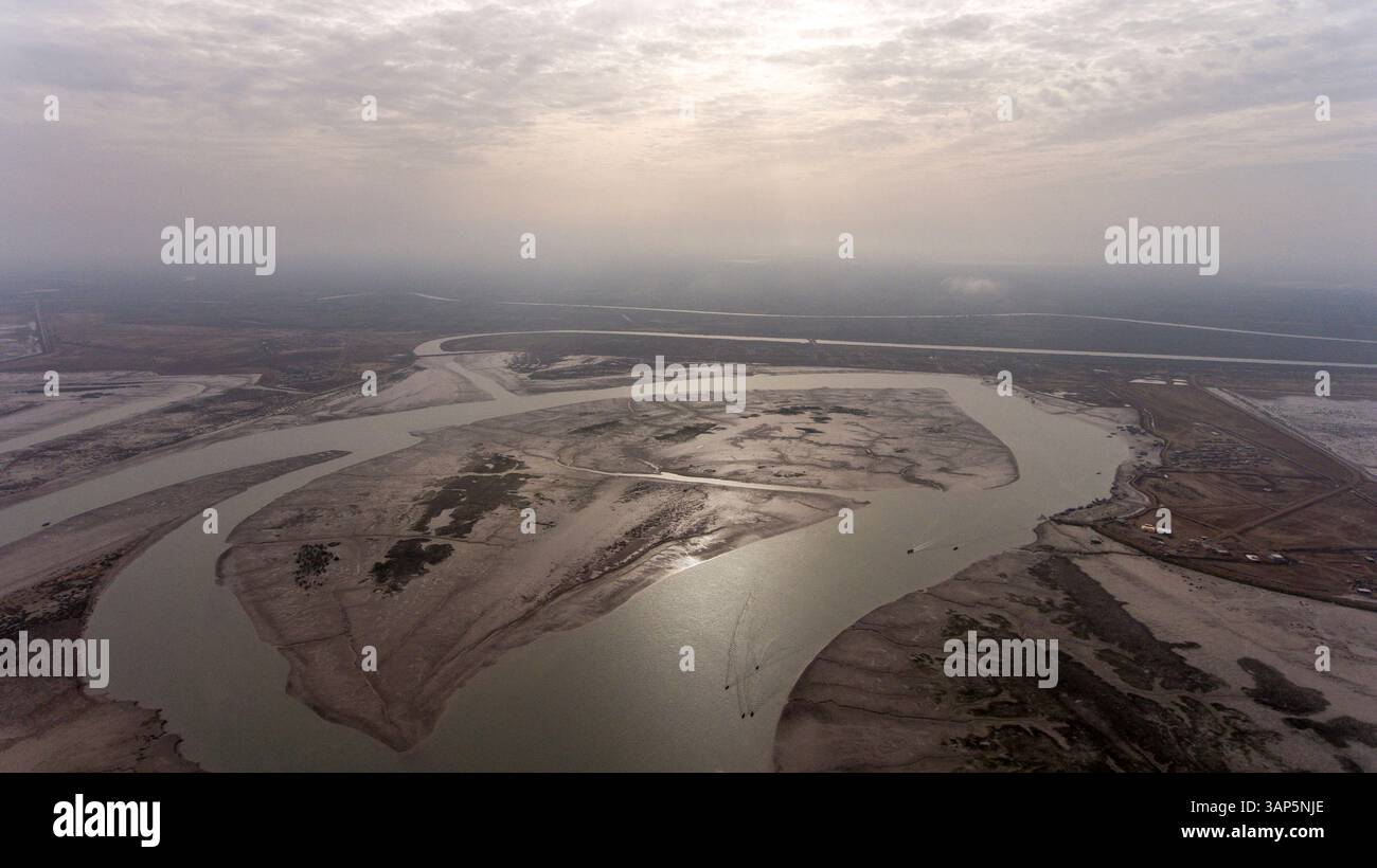Aerial view of serene mangroves and river landscape with beautiful sky ...