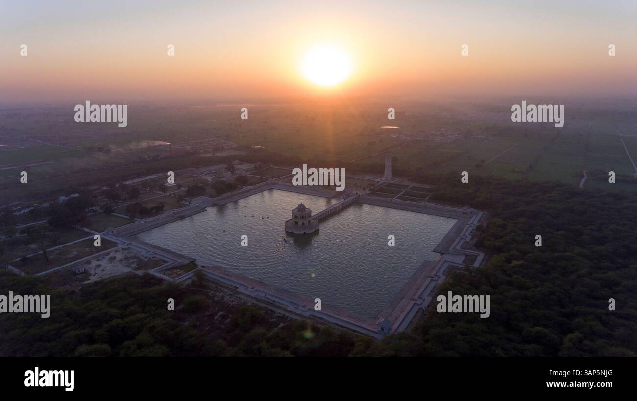 Aerial view of Hiran Minar at sunset with beautiful reflections in the ...