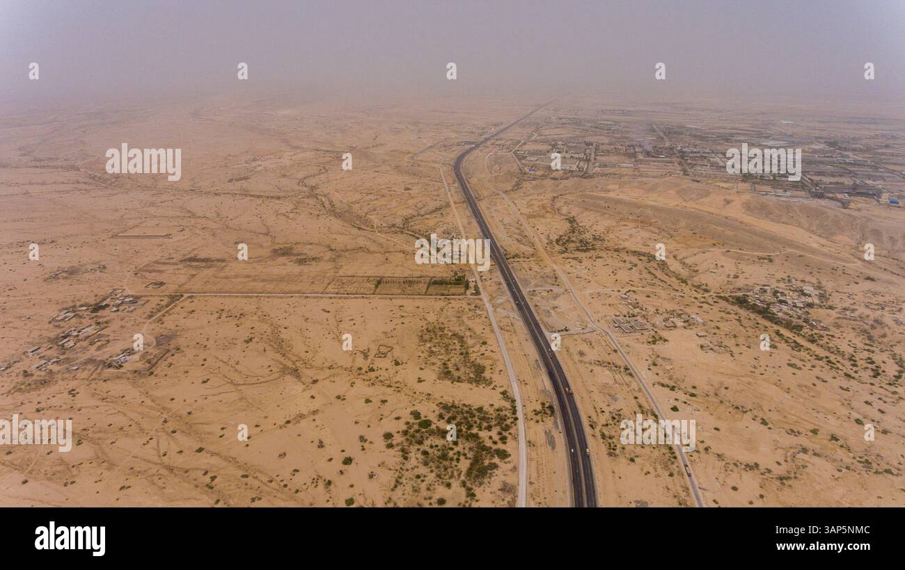 Aerial view of the vast sandy desert landscape with the Hyderabad ...