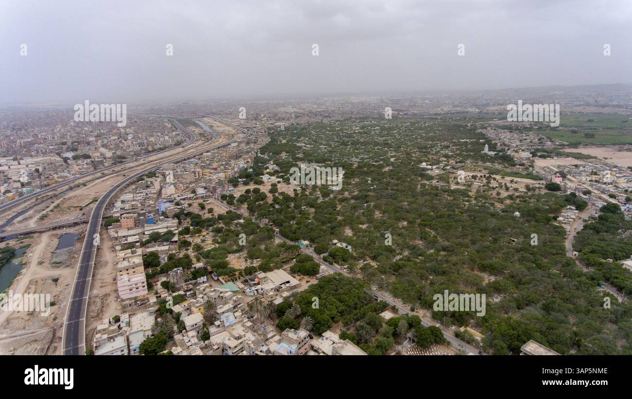Aerial view of lyari expressway with dense urban architecture and ...