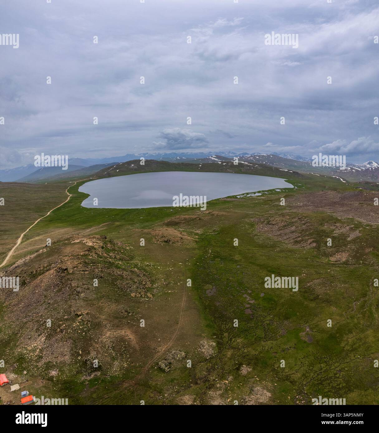 Aerial view of serene Deosai Plains with beautiful lake and majestic ...