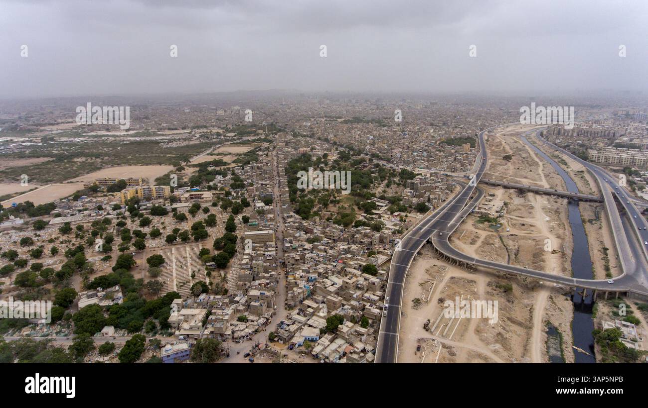 Aerial view of lyari expressway amidst urban development and cityscape ...