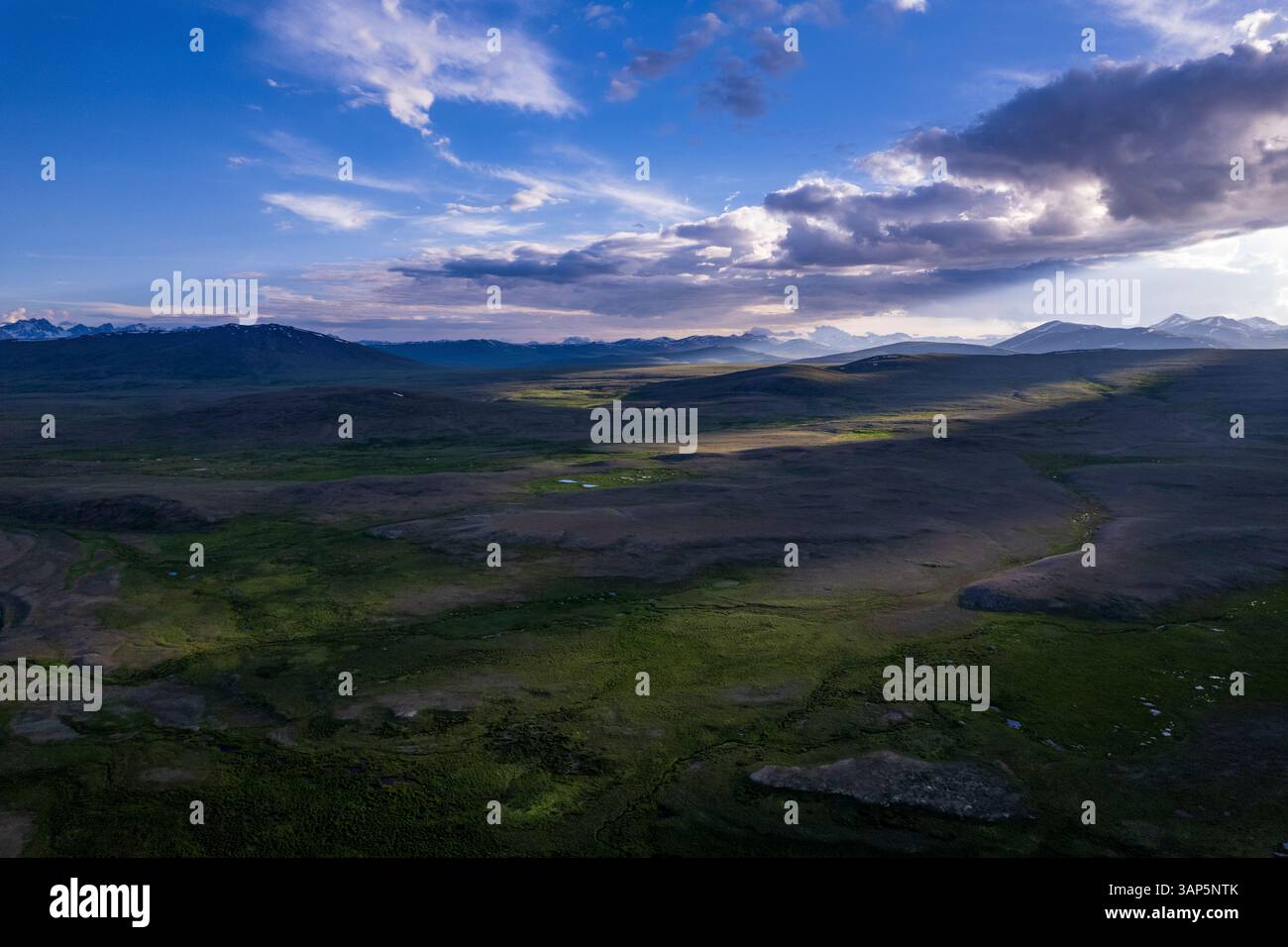 Aerial view of deosai plains with majestic mountains and peaceful ...