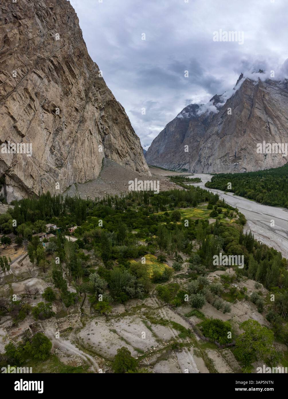 Aerial view of breathtaking Dumsum Valley with majestic mountains, lush forests, and a serene ...