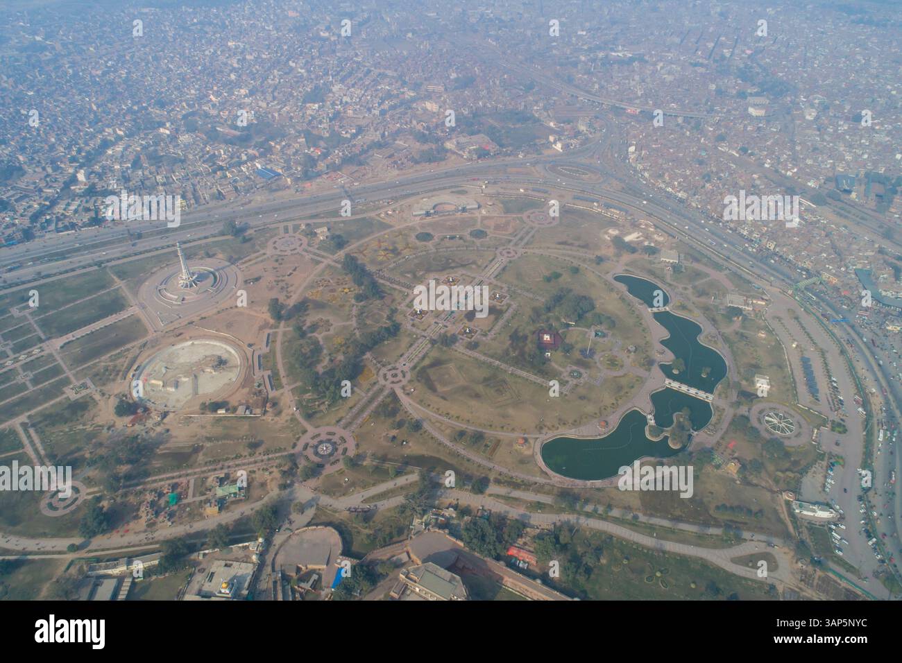 Aerial view of Minar-e-Pakistan surrounded by beautiful greenery and ...