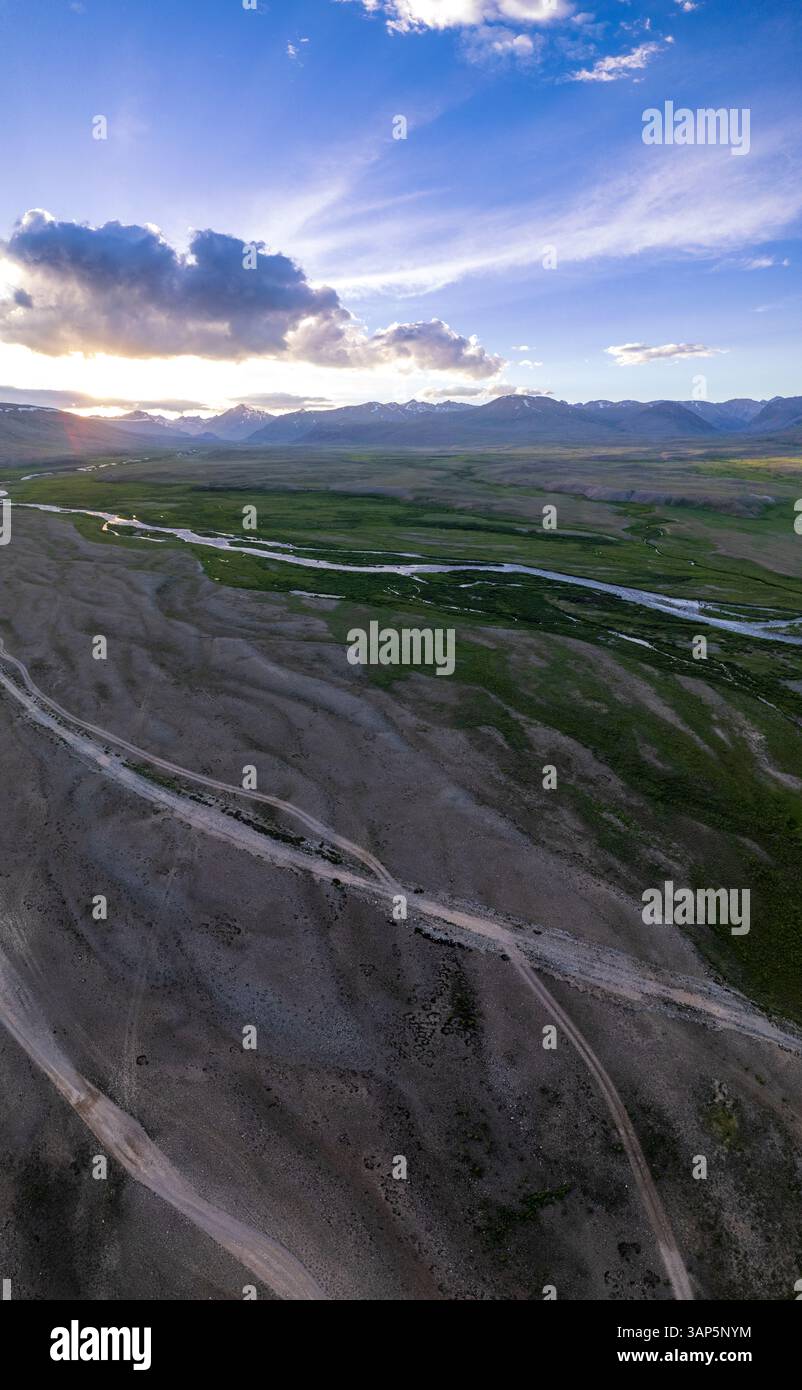 Aerial view of breathtaking Deosai Plains with majestic mountains ...