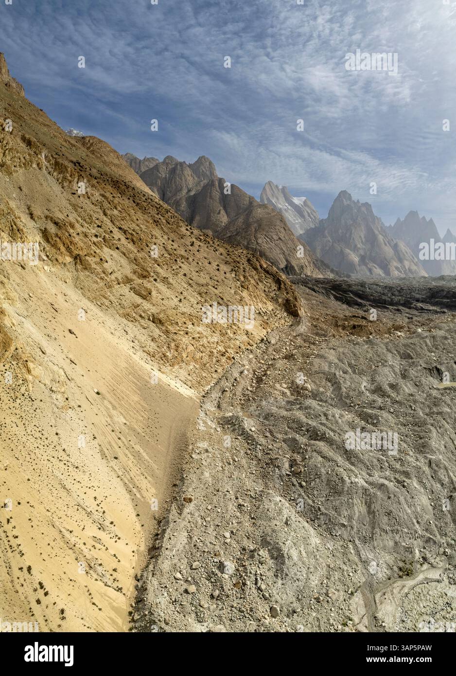 Aerial view of rugged and majestic mountains with barren terrain and ...
