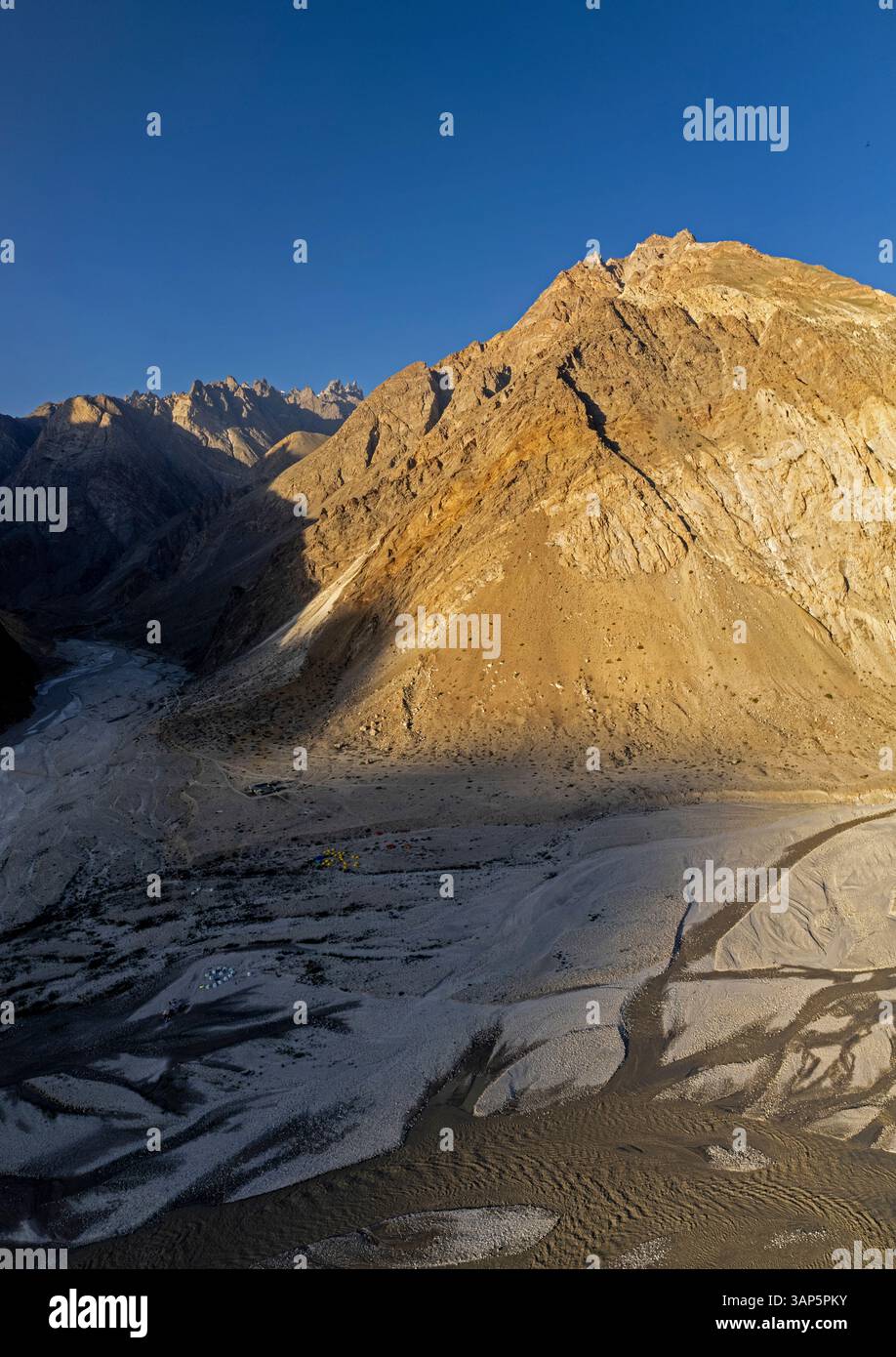Aerial view of majestic mountains and expansive valleys with rugged ...