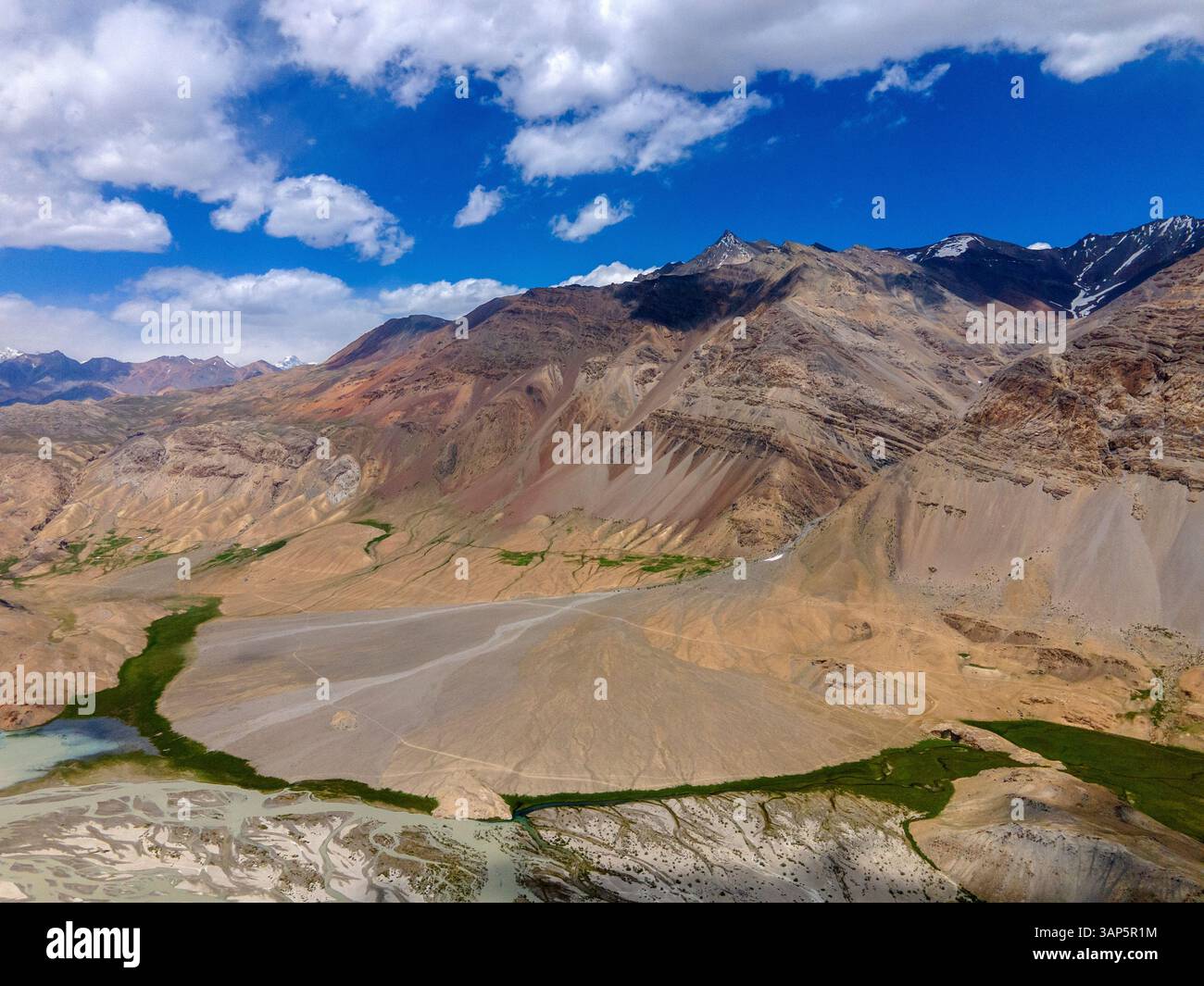 Aerial view of Chatibo Glacier surrounded by majestic mountains and a ...