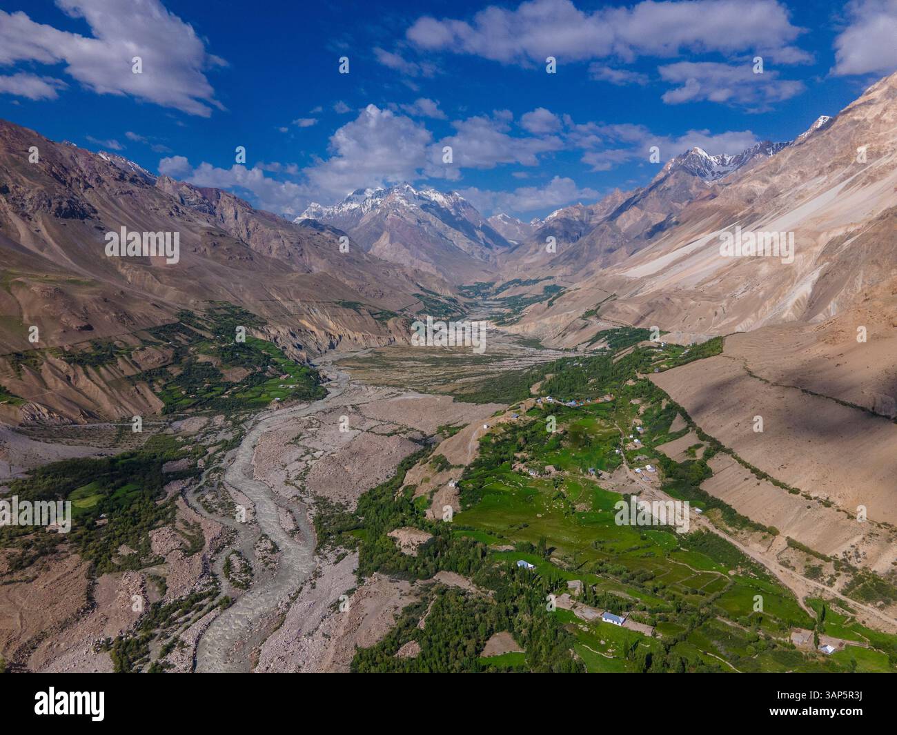 Aerial view of serene Yarkhoon Lasht valley surrounded by majestic ...