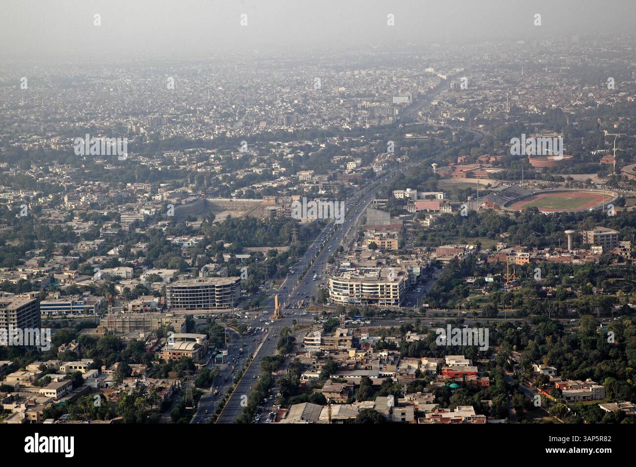 Aerial view of bustling urban landscape with dense buildings and ...